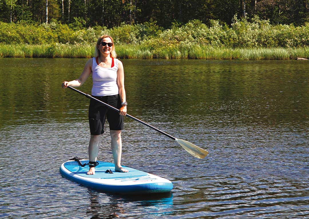 Sup Boarding on lake Rukajärvi - Ruka Safaris, on the edge of Lapland